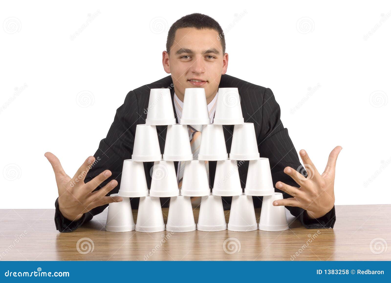 Businessman Building Cups Pyramid Stock Photo - Image of organize ...