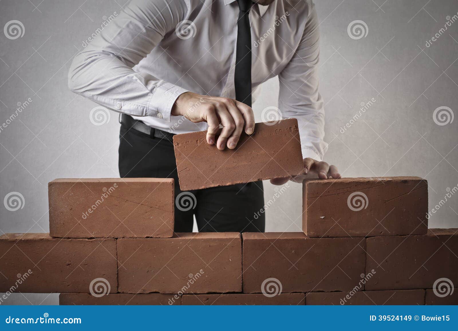 Businessman Building a Wall Stock Image - Image of work, businessman ...