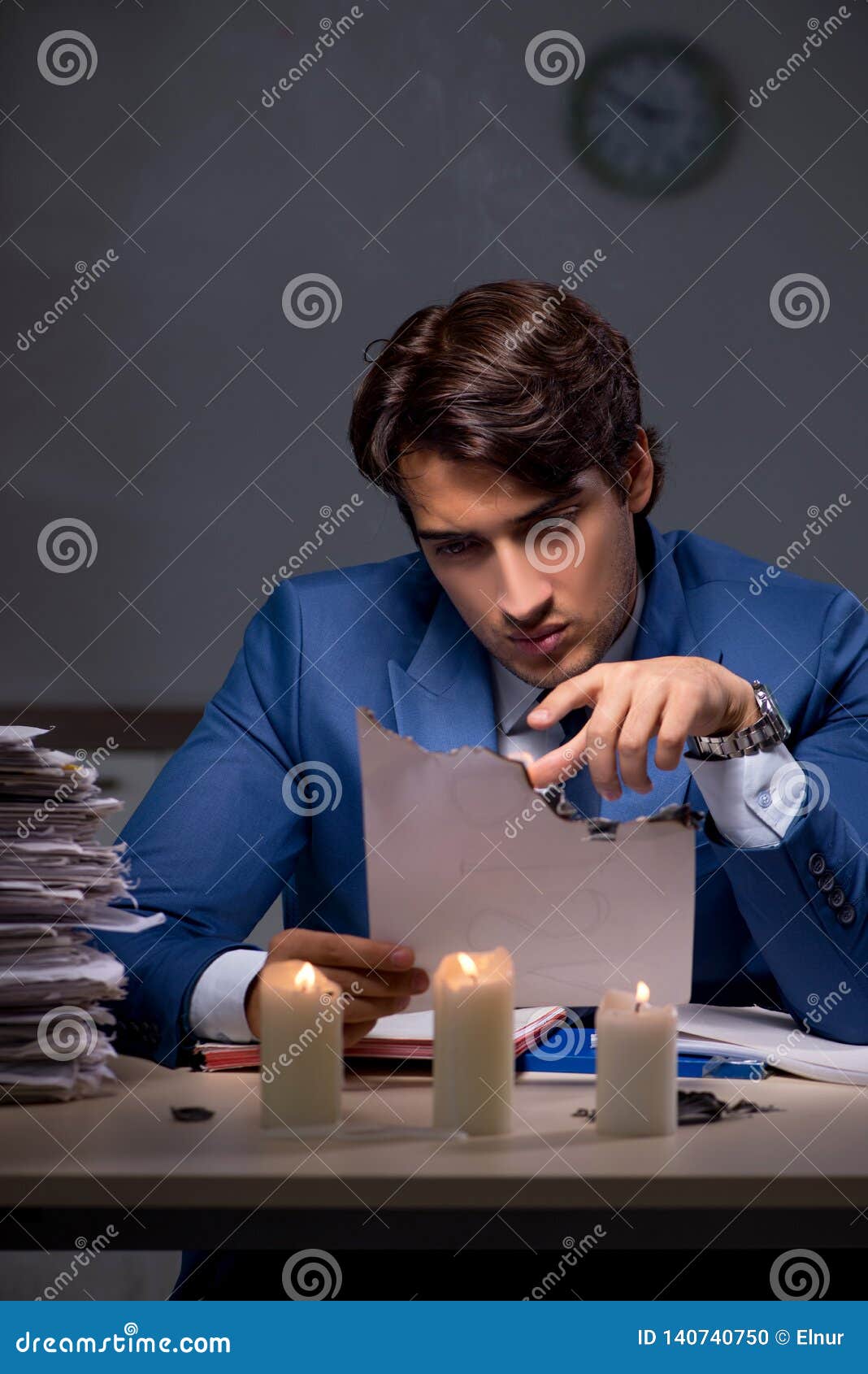 The Businessman Burning the Evidence Late in Office Stock Photo - Image ...