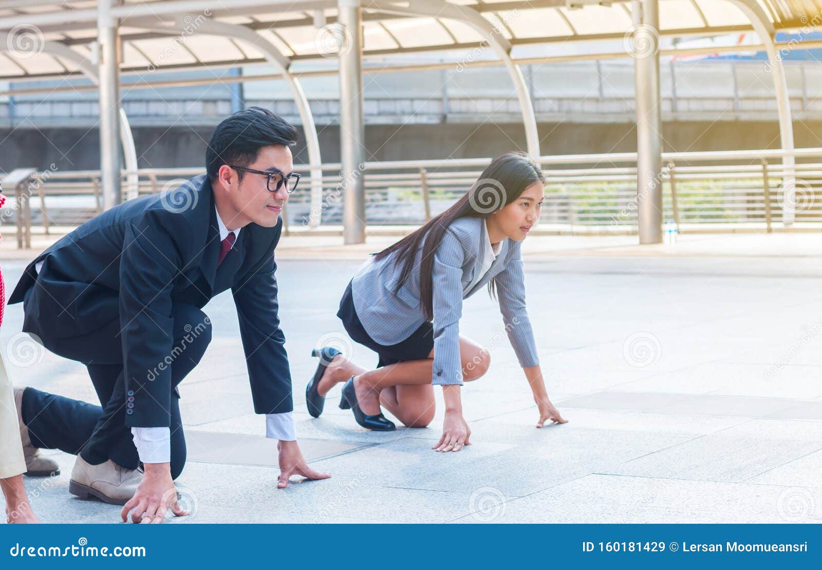 The Businessman and Businesswoman Ready To Run on Start Position with ...