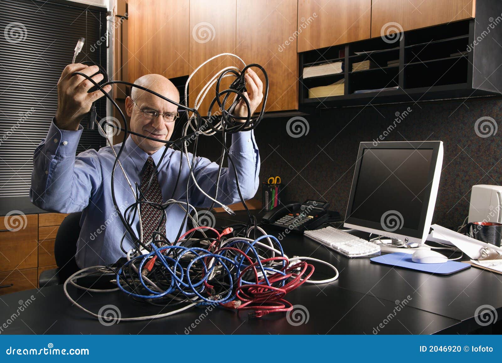 Businessman with cables stock photo. Image of male, frustration - 2046920