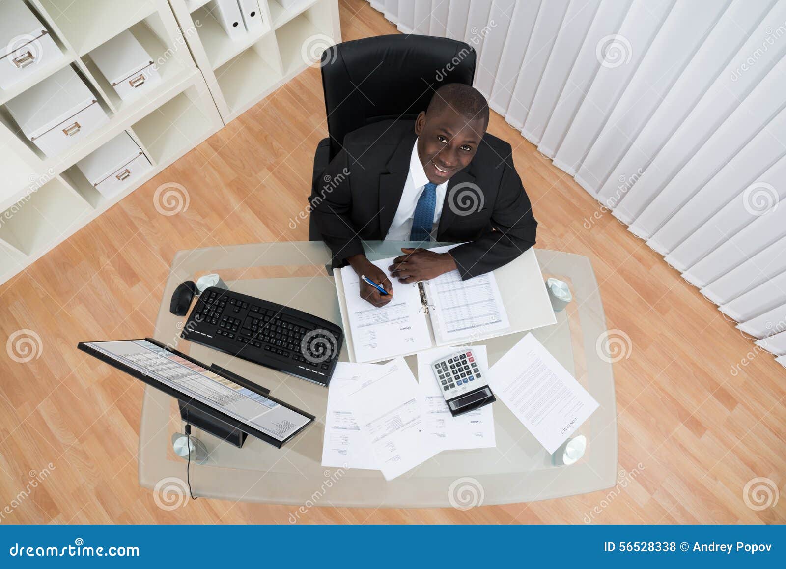 Businessman Calculating Bills in Office Stock Photo - Image of computer ...