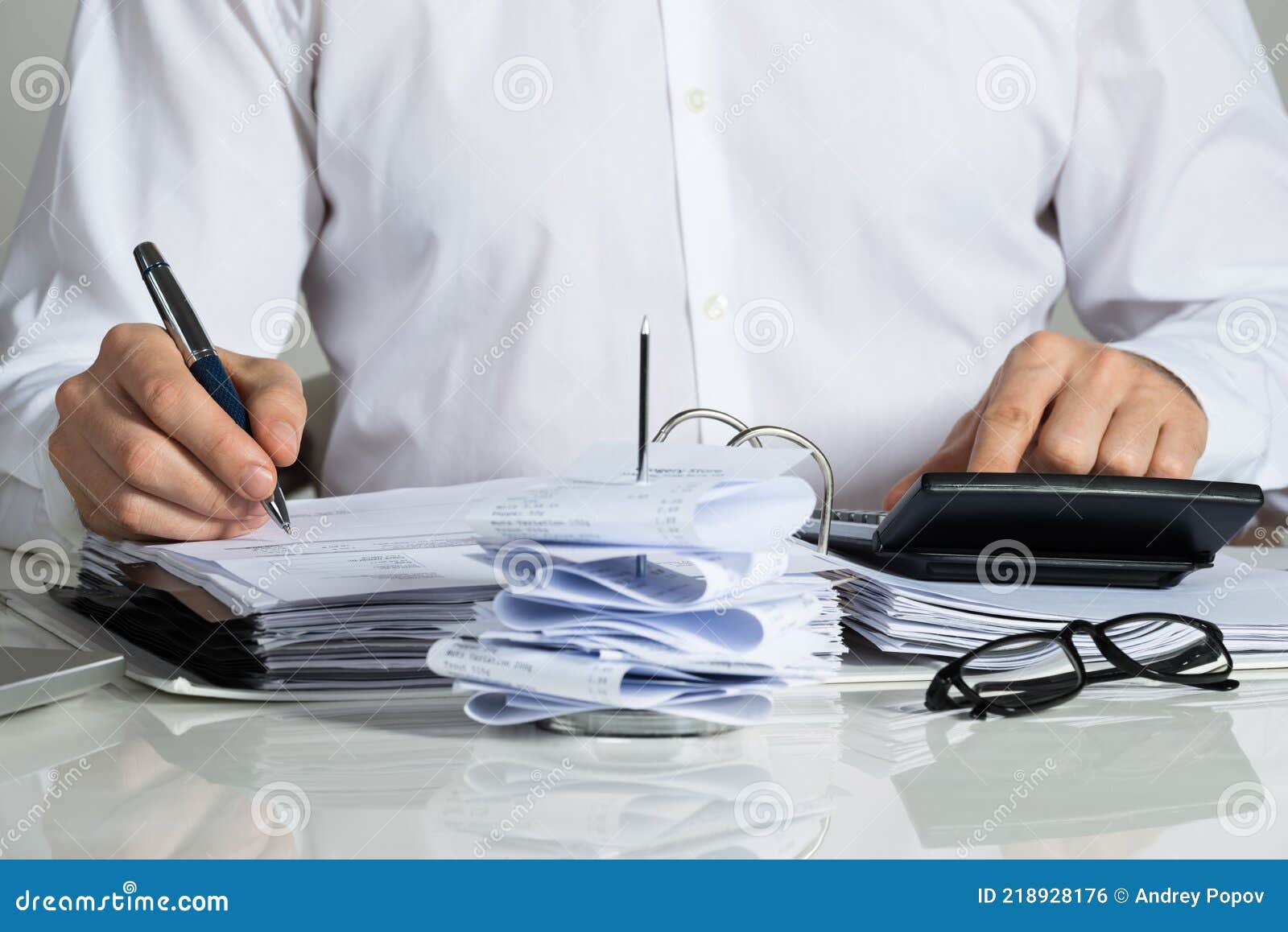Businessman Calculating Invoice at Desk Stock Photo - Image of ...