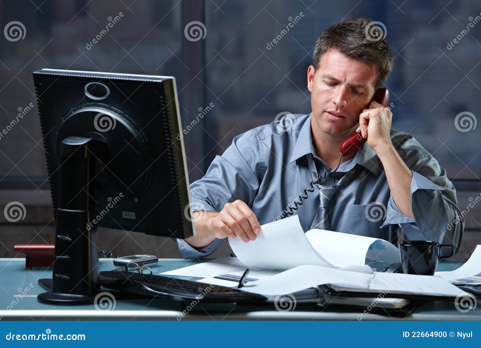 Businessman on Call in Overtime Stock Photo - Image of indoor ...