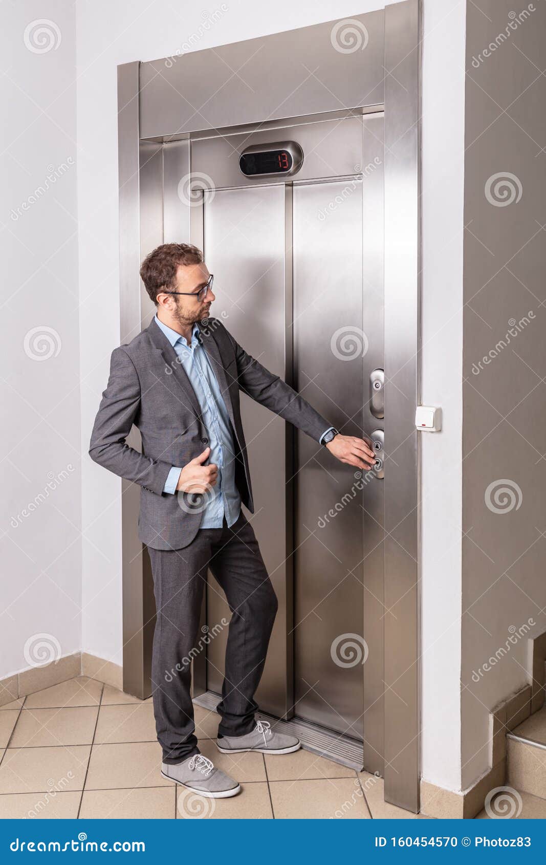 Businessman Calling the Elevator Stock Photo - Image of office, modern: 160454570