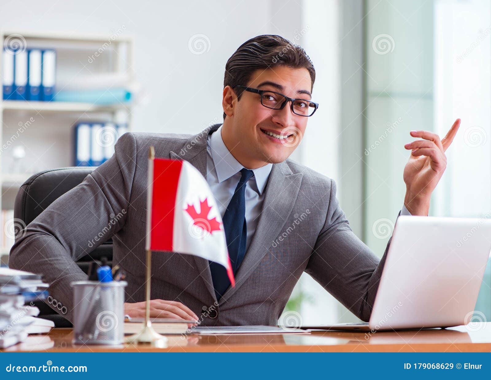 Businessman with Canadian Flag in Office Stock Image - Image of courses ...