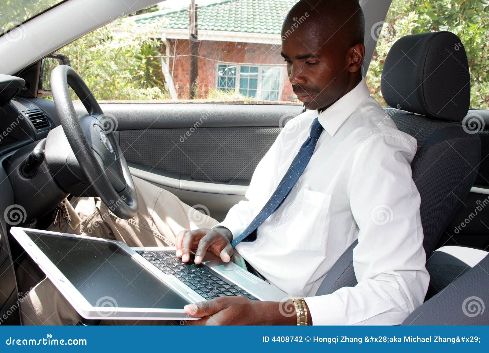 Businessman in a car stock photo. Image of expensive, gear - 4408742