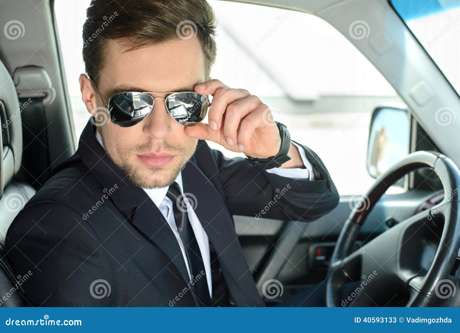 Businessman in the Car stock image. Image of auto, suit - 40593133