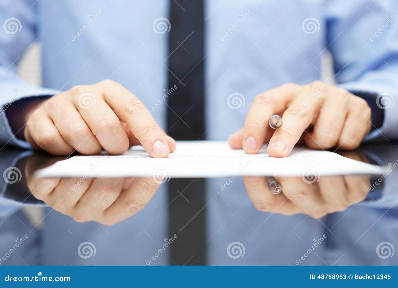 Businessman is Carefully Reading Contract Stock Image - Image of ...
