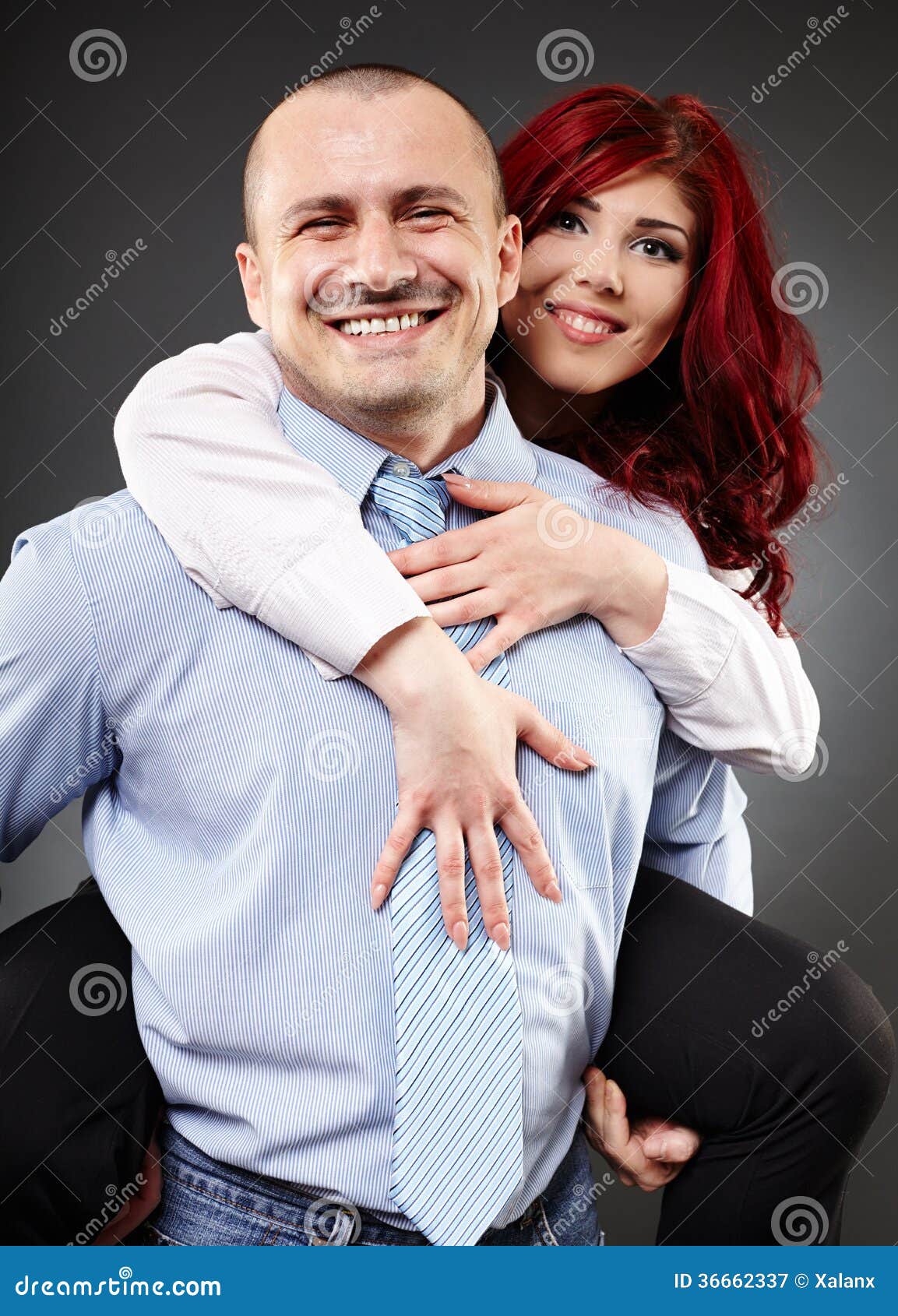 Businessman Carrying His Partner in the Back Stock Image - Image of ...