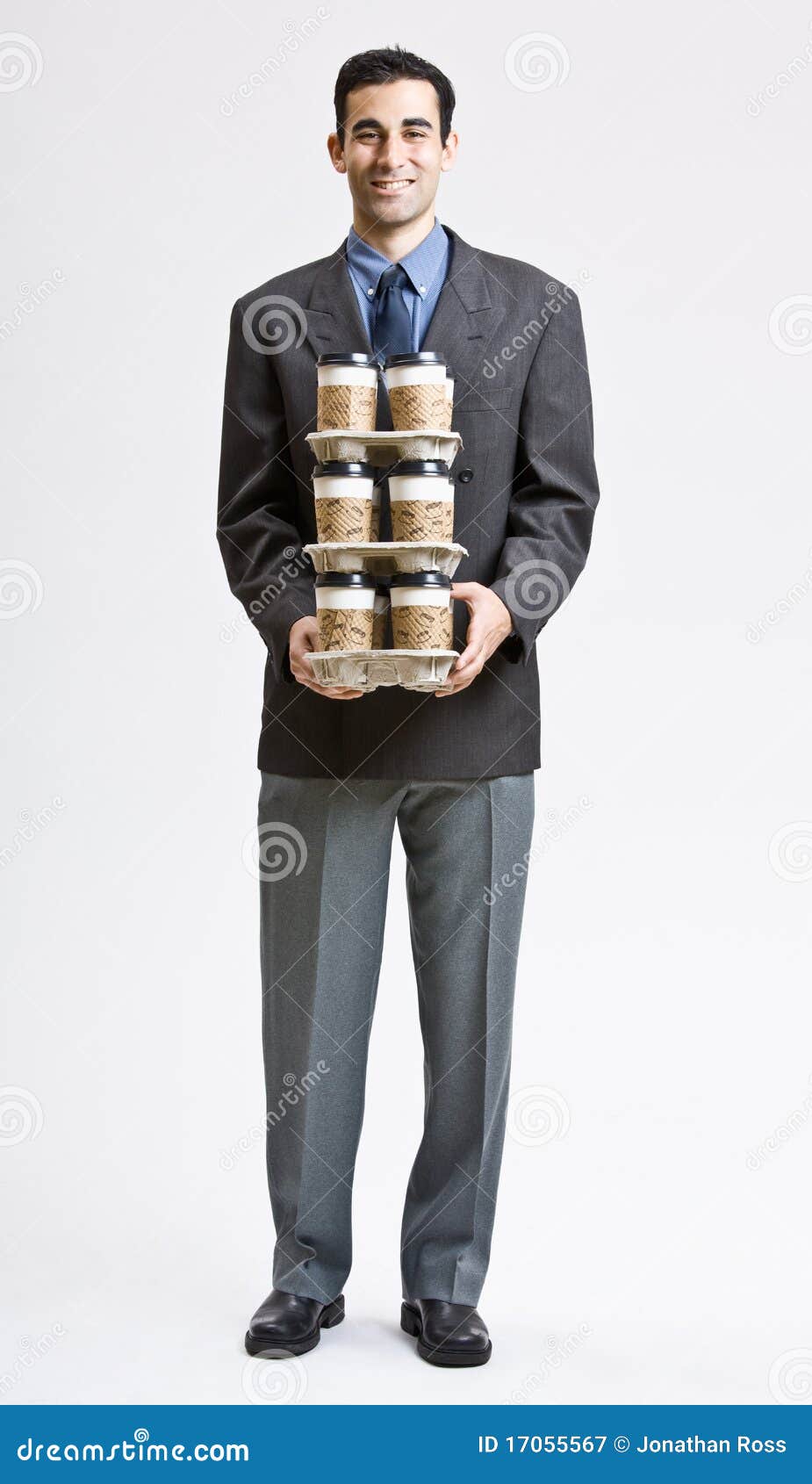 Businessman Carrying Stack of Coffee Cups Stock Image - Image of smile ...