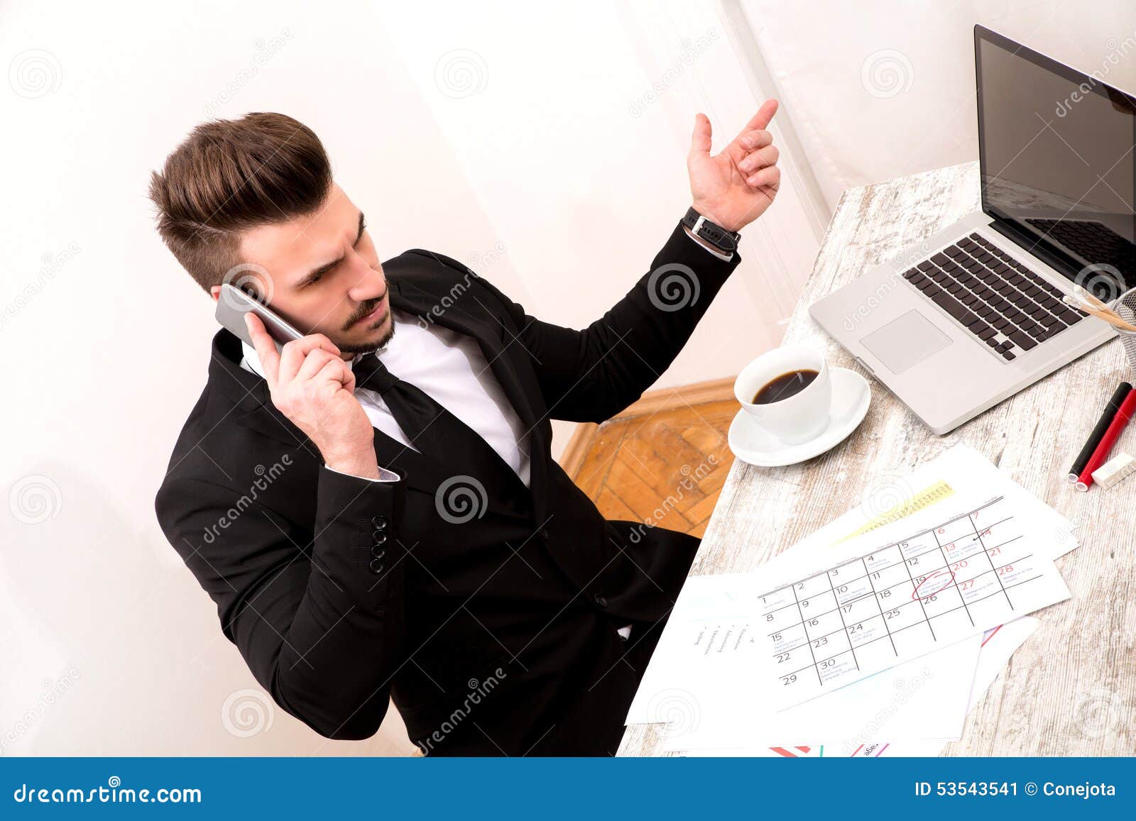 Businessman Checking Appointments in the Calendar and Talking by Stock ...