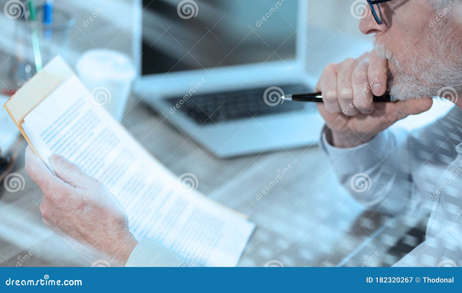 Businessman Checking a Document; Light Effect Stock Image - Image of ...