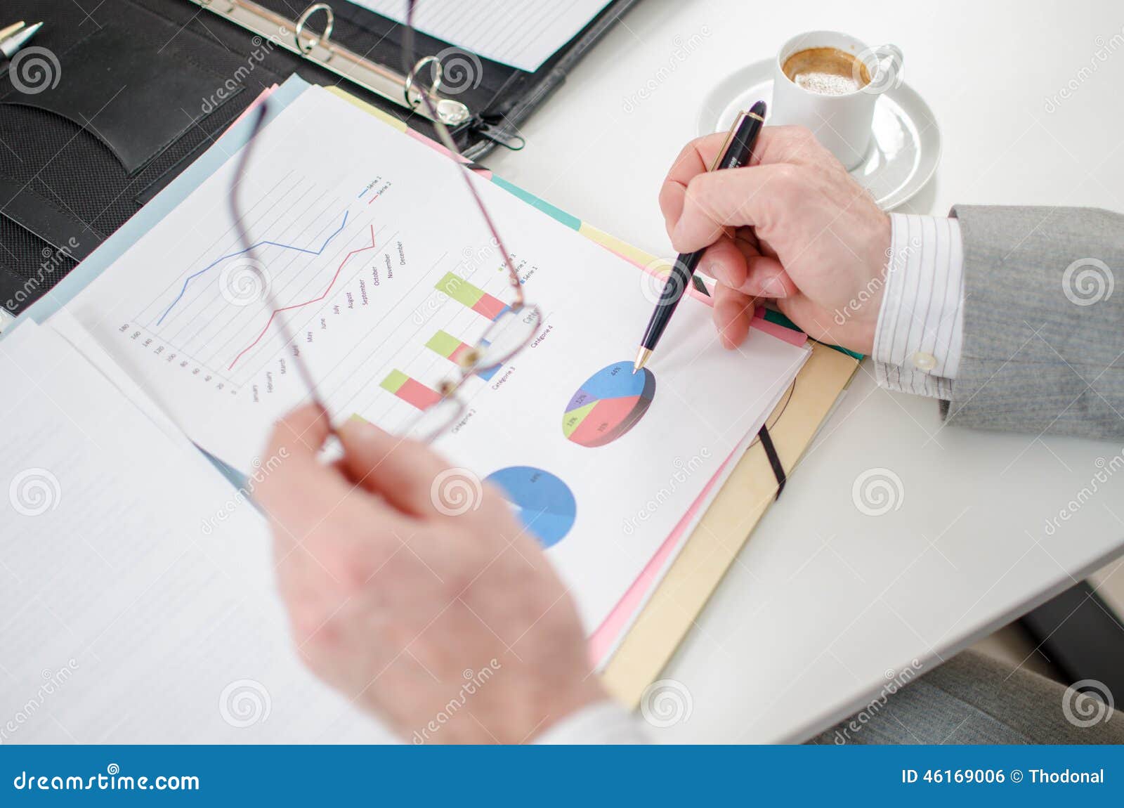 Businessman Checking Financial Graphs Stock Photo - Image of budget ...
