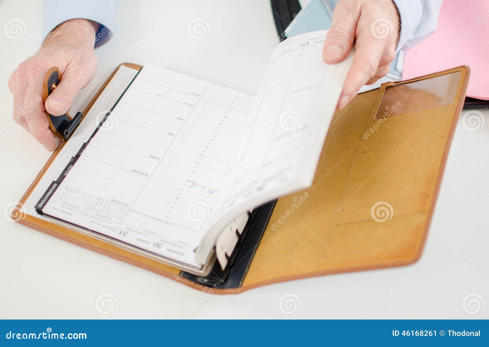 Businessman Checking His Diary Stock Image - Image of workplace, diary ...