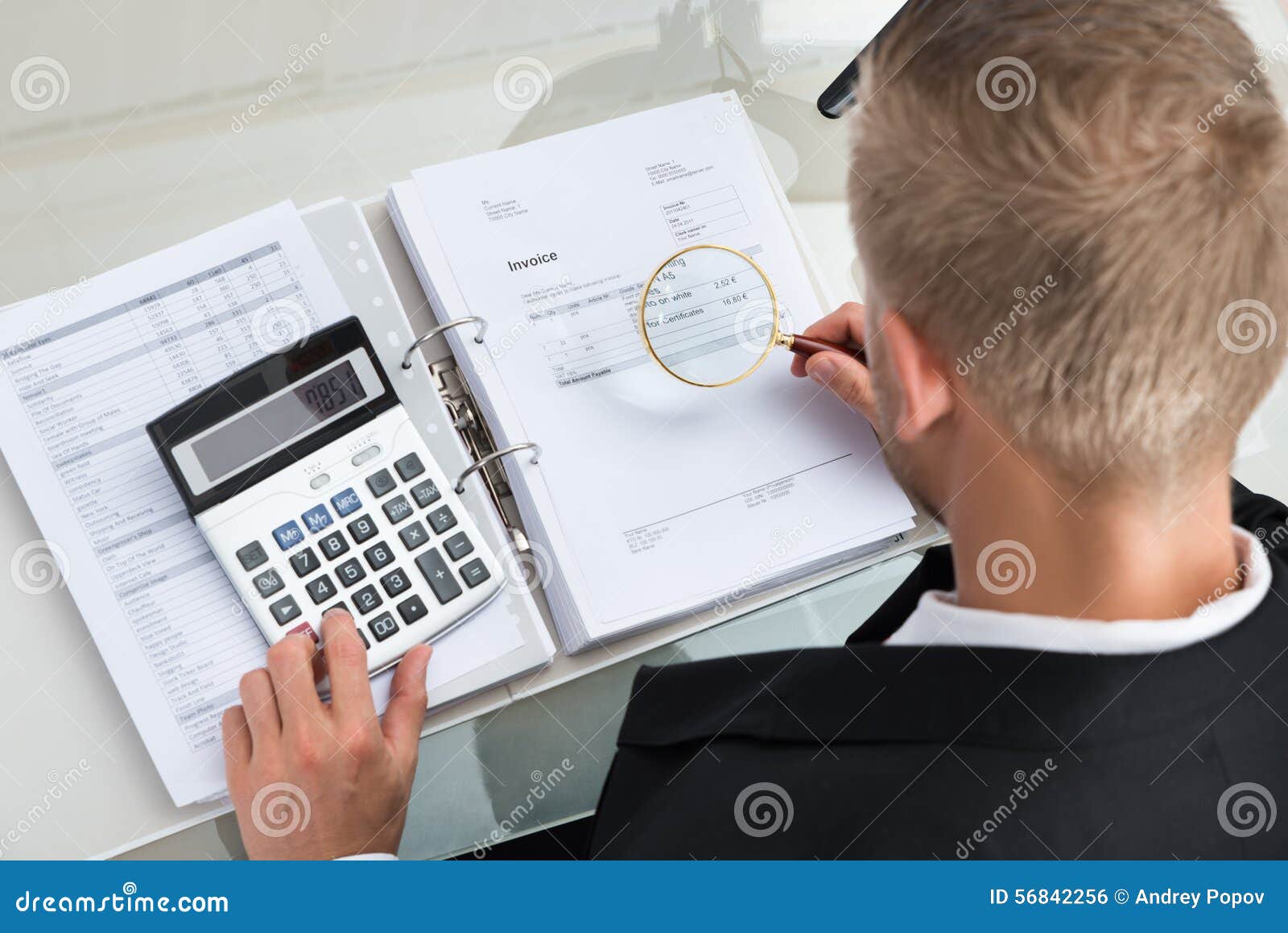 Businessman Checking Invoice with Magnifying Glass Stock Photo - Image ...