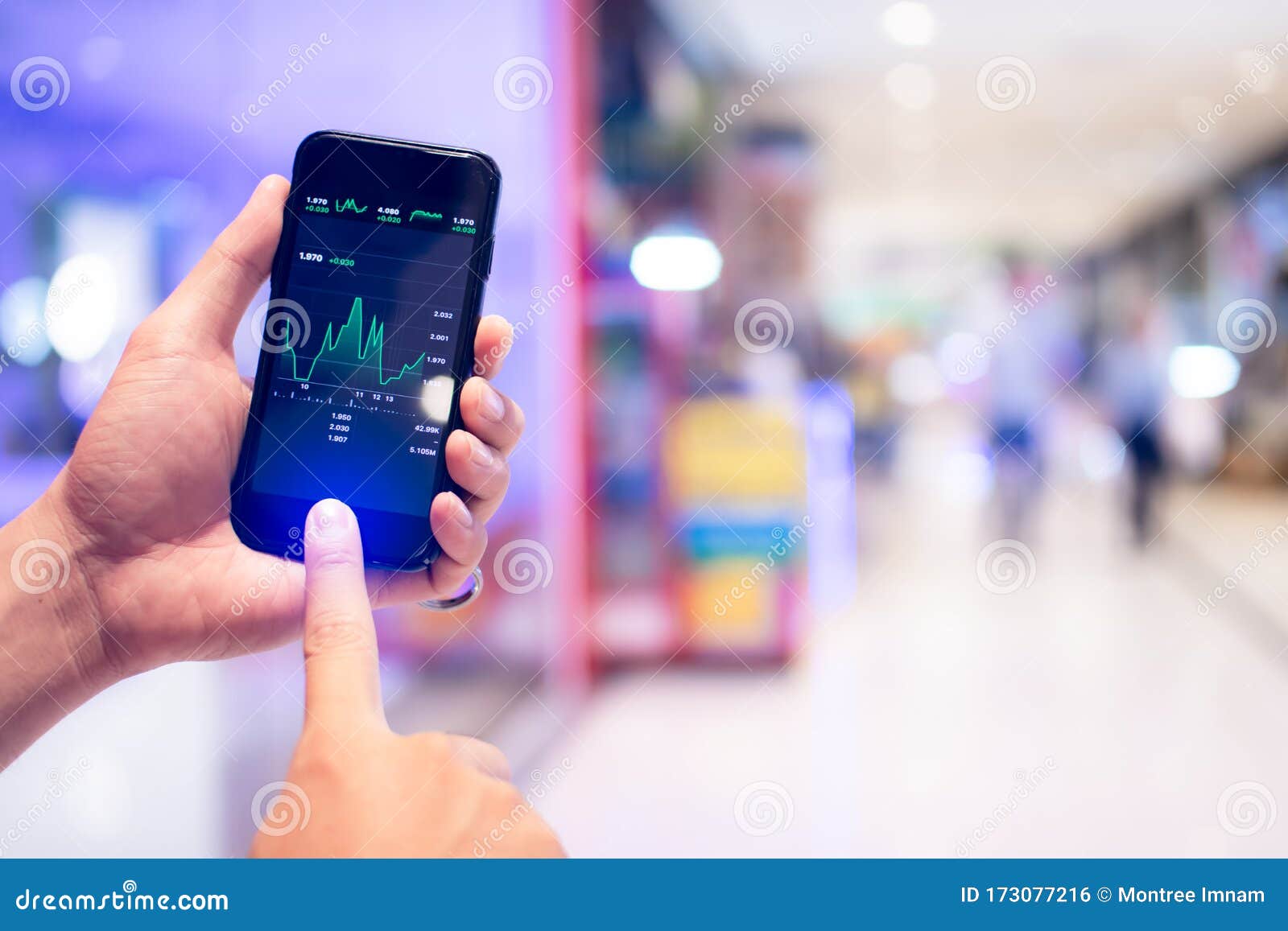 Businessman Checking Stock Market Data. he Using a Mobile Phone Stock ...