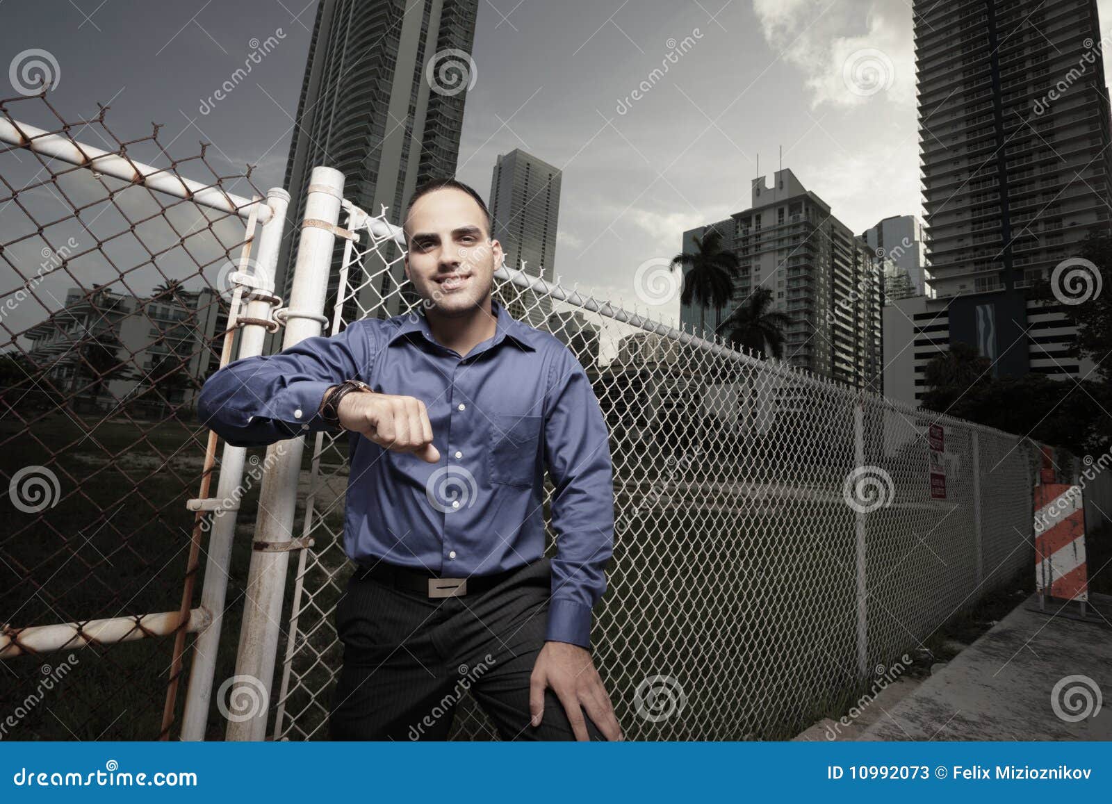 Businessman Checking the Time Stock Image - Image of dusk, happy: 10992073