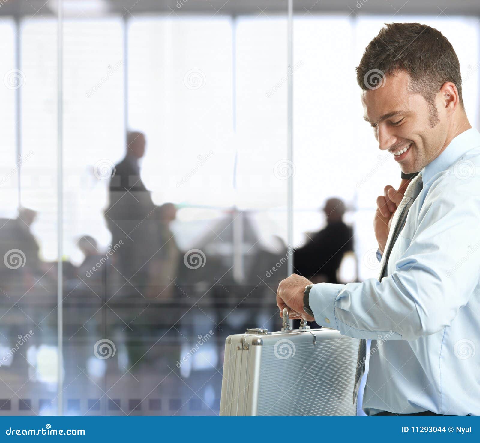 Businessman checking time stock photo. Image of confidence - 11293044
