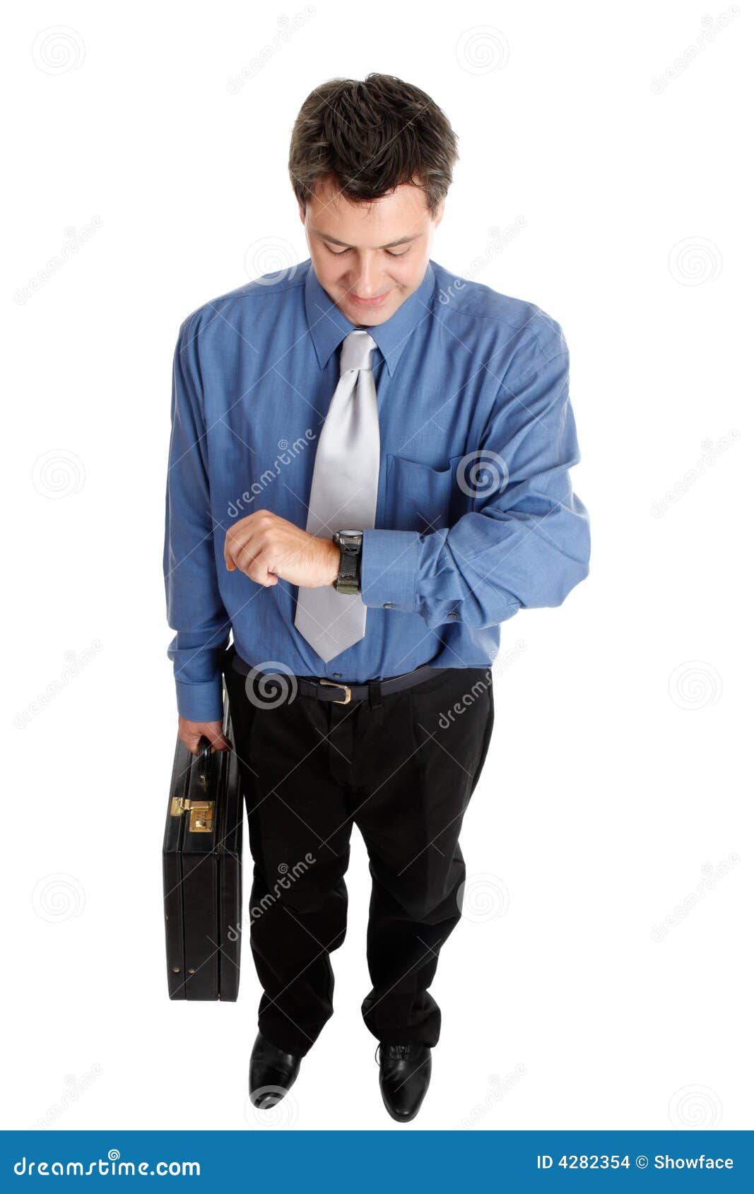 Businessman checking time stock photo. Image of isolated - 4282354