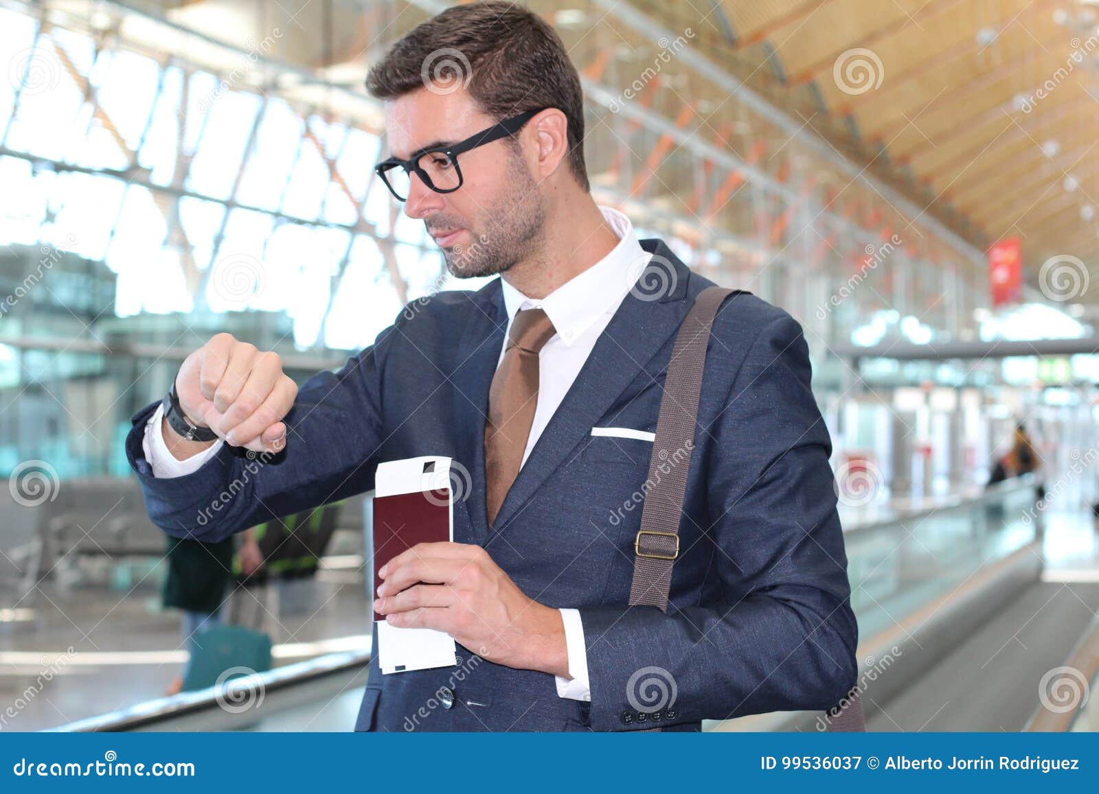 Businessman Checking the Time in the Airport Stock Image - Image of ...