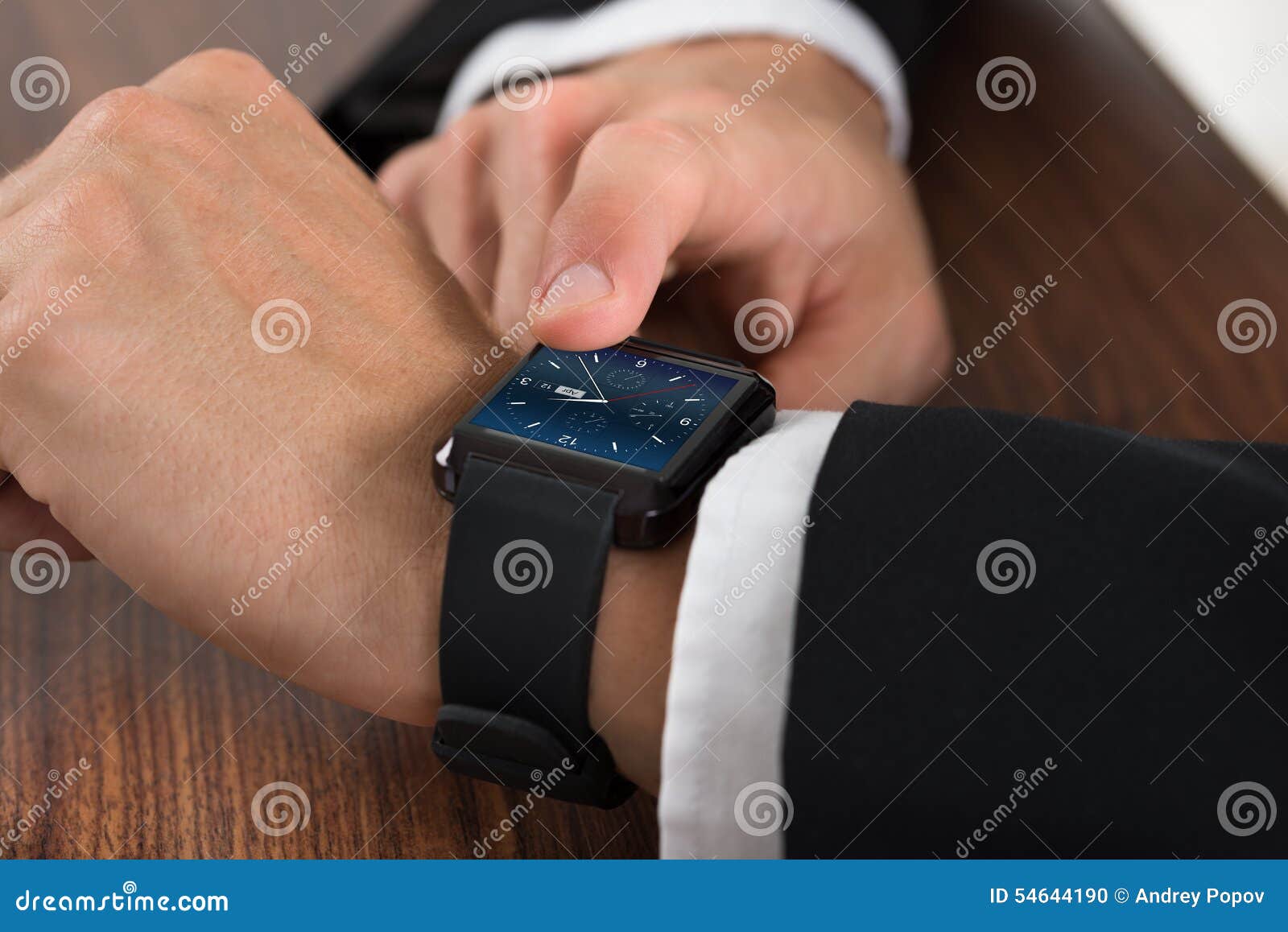 Businessman checking time stock photo. Image of punctual - 54644190