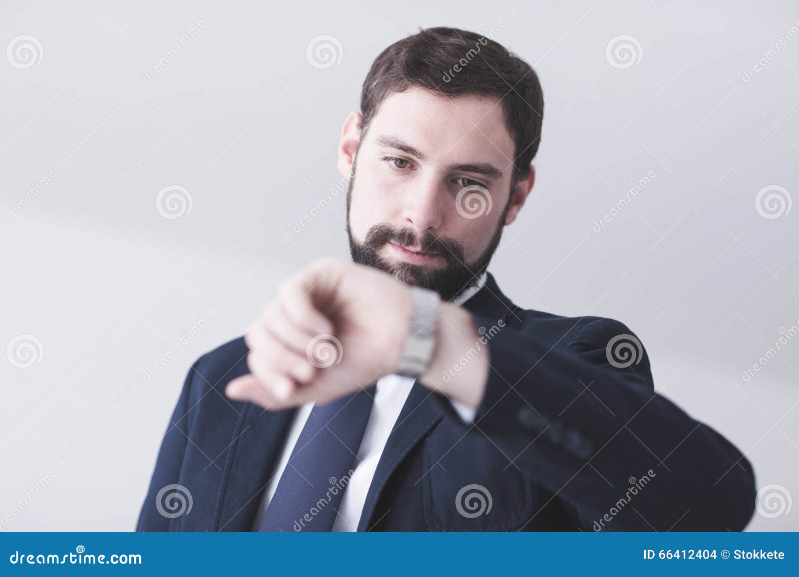 Businessman Checking the Time Stock Photo - Image of adult, corporate ...
