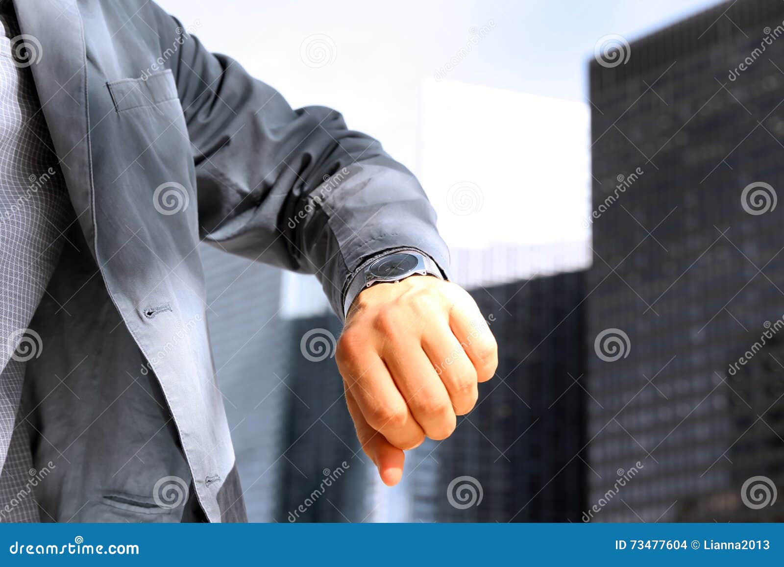 Businessman Checking Time on His Watch . Stock Photo - Image of ...