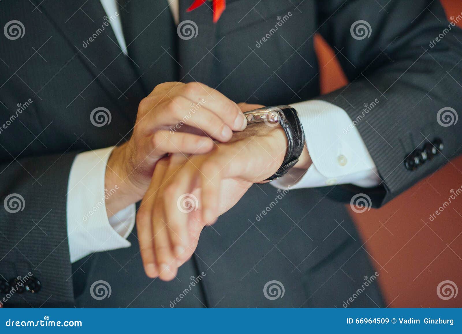 Businessman Checking the Time on His Watch Stock Image - Image of ...