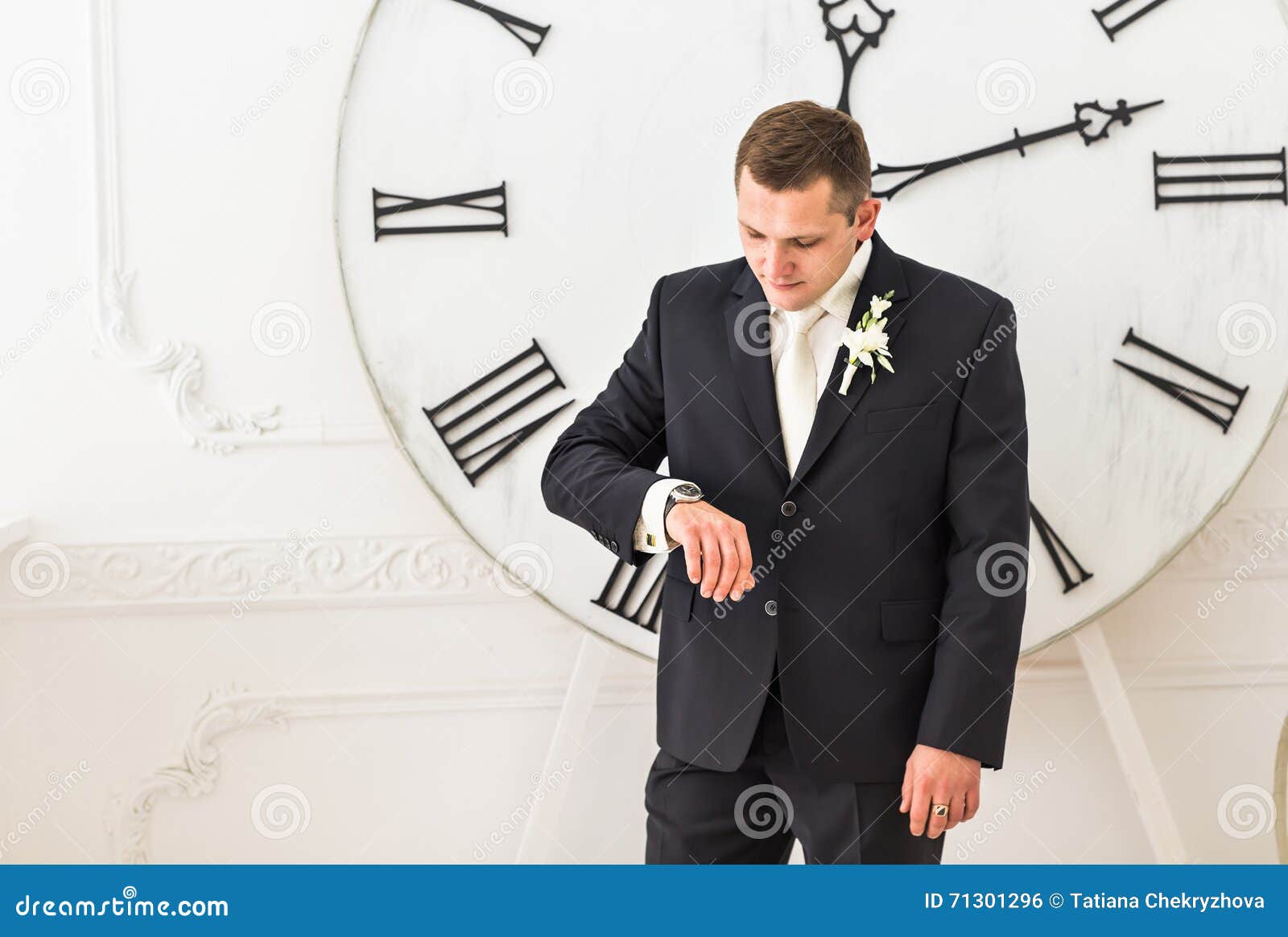 Businessman Checking Time on His Watch Stock Photo - Image of backward ...