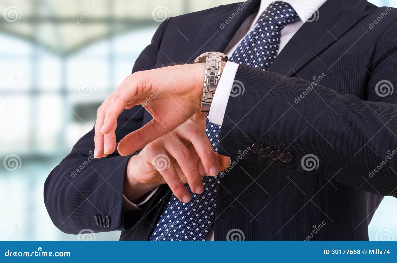 Business Man Checking Time on His Wristwatch. Stock Photo - Image of ...