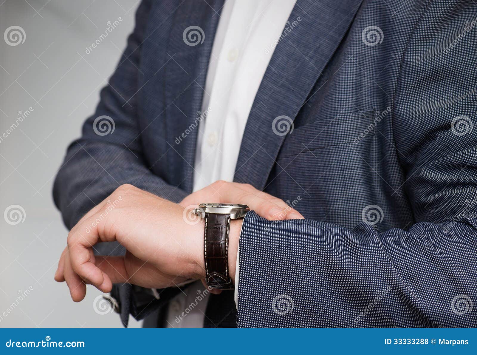 Businessman Checking the Time Stock Photo - Image of checking, hurry ...