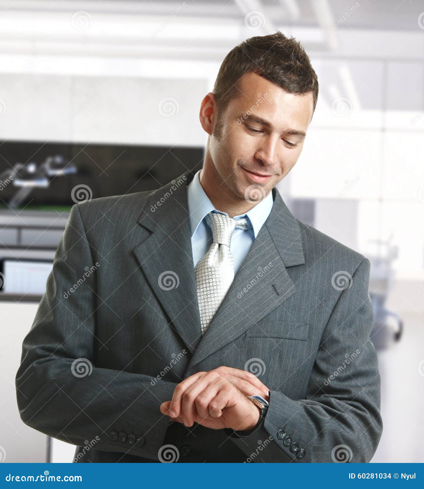 Businessman Checking Time in Office Stock Photo - Image of person ...