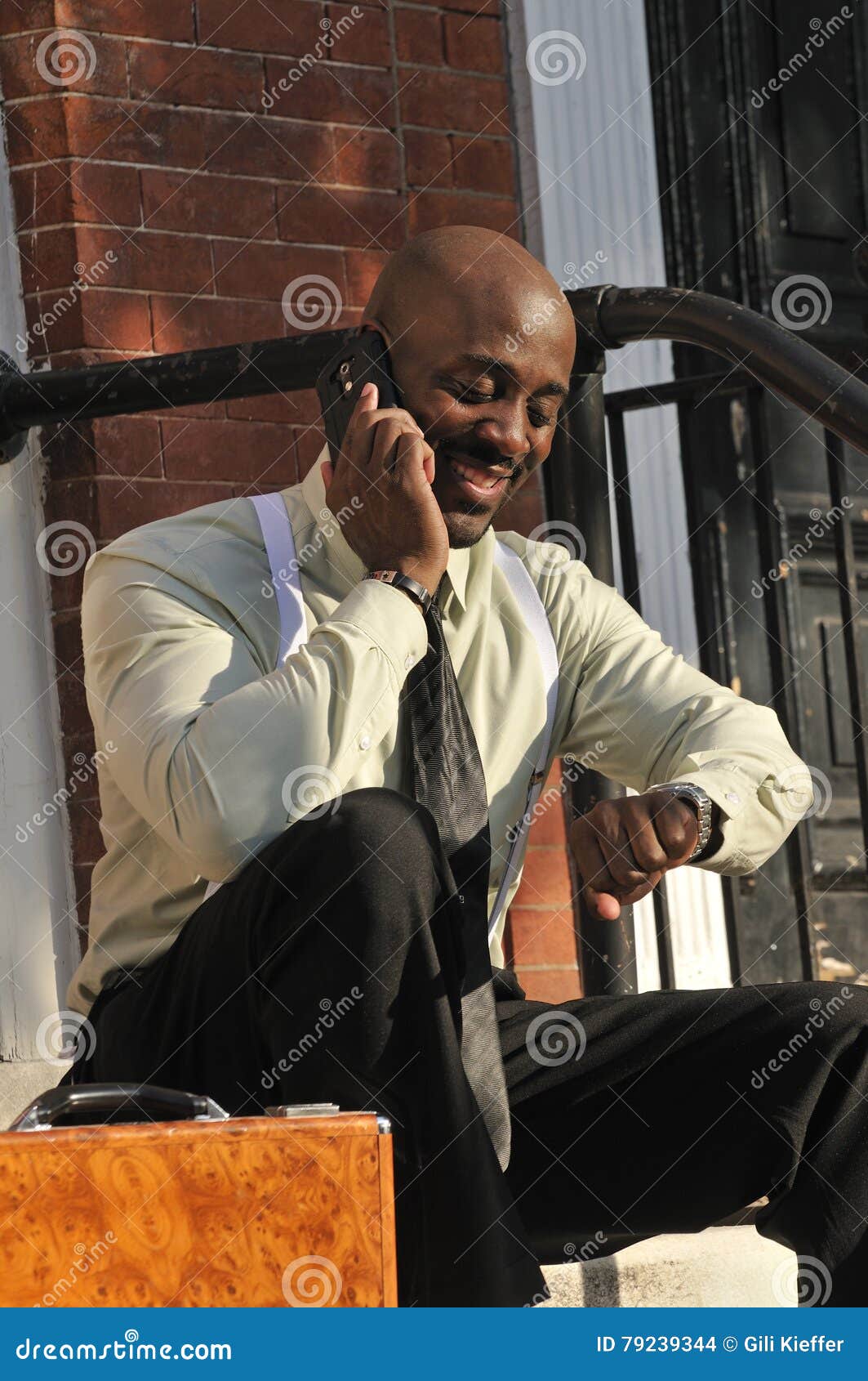 Businessman Checking the Time, Speaking on Phone Stock Photo - Image of ...