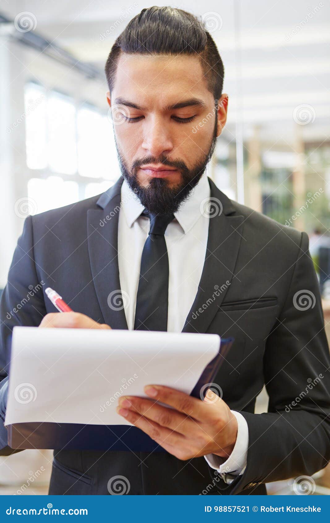 Businessman with checklist stock image. Image of manager - 98857521