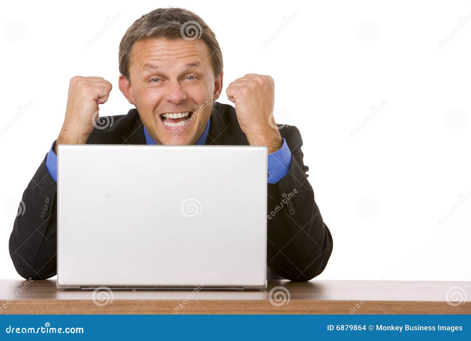 Businessman Cheering at Laptop Stock Photo - Image of desk, space: 6879864