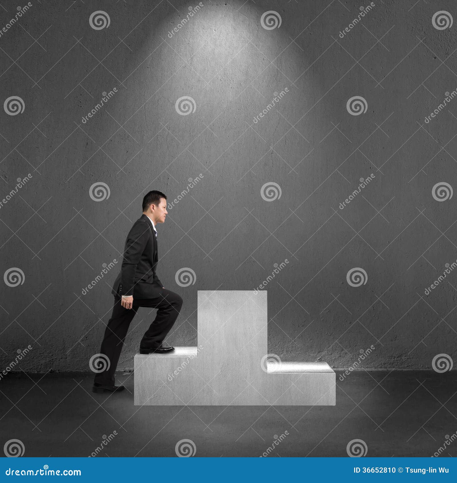Businessman Climbing on Podium with Spot Lighting Stock Photo - Image ...