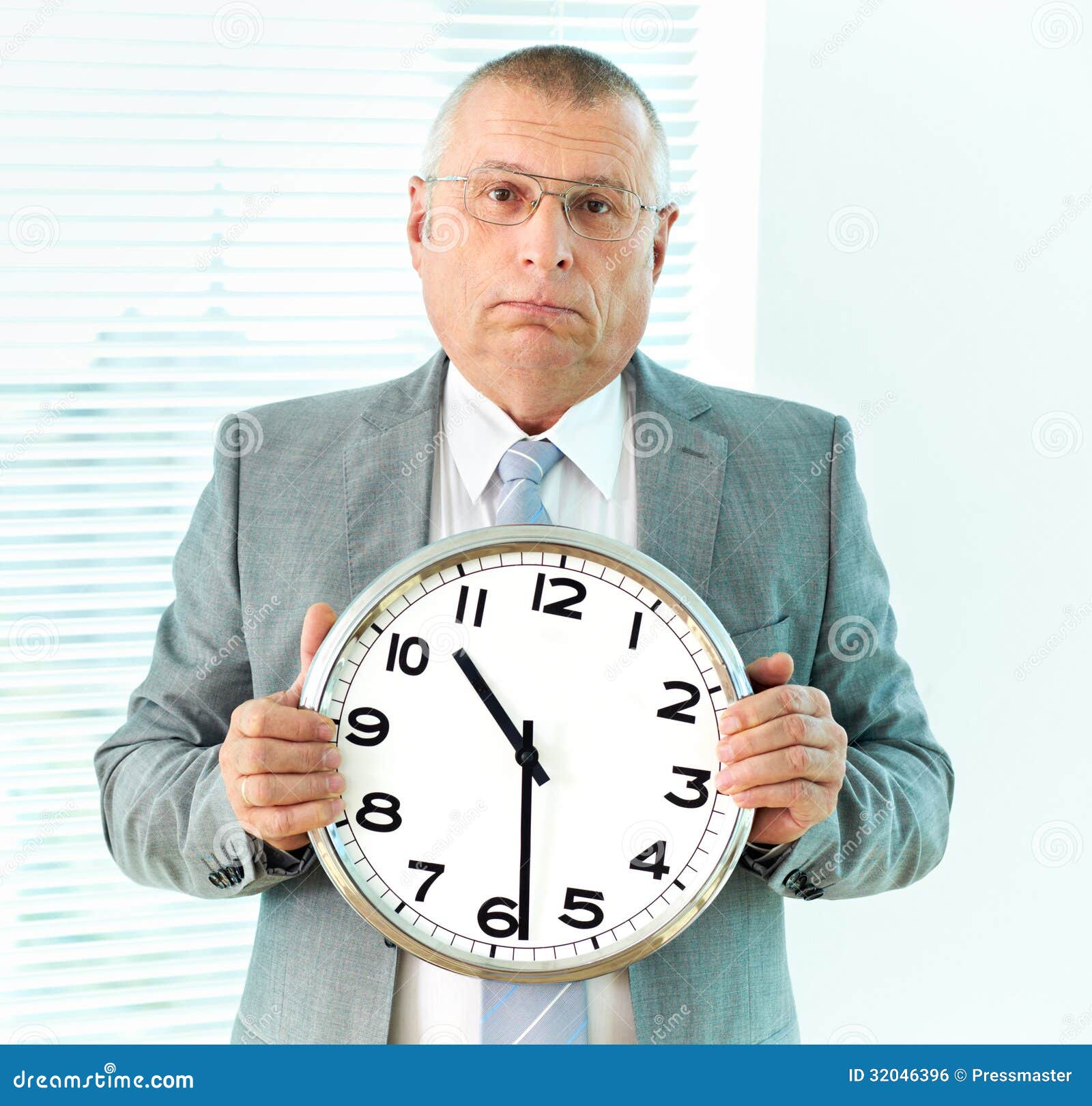 Businessman with clock stock photo. Image of executive - 32046396
