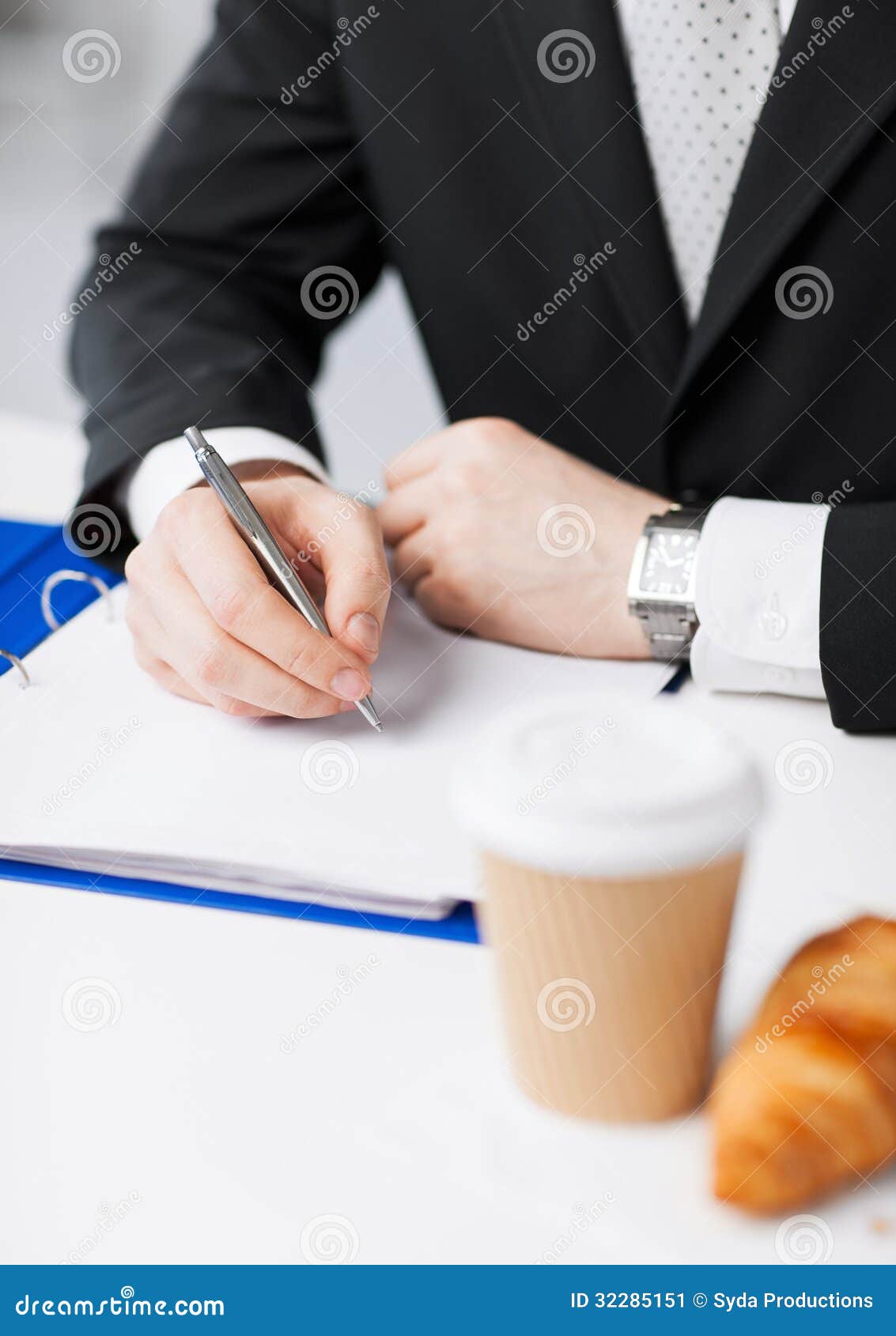 Businessman with Coffee Writing Something Stock Image - Image of ...