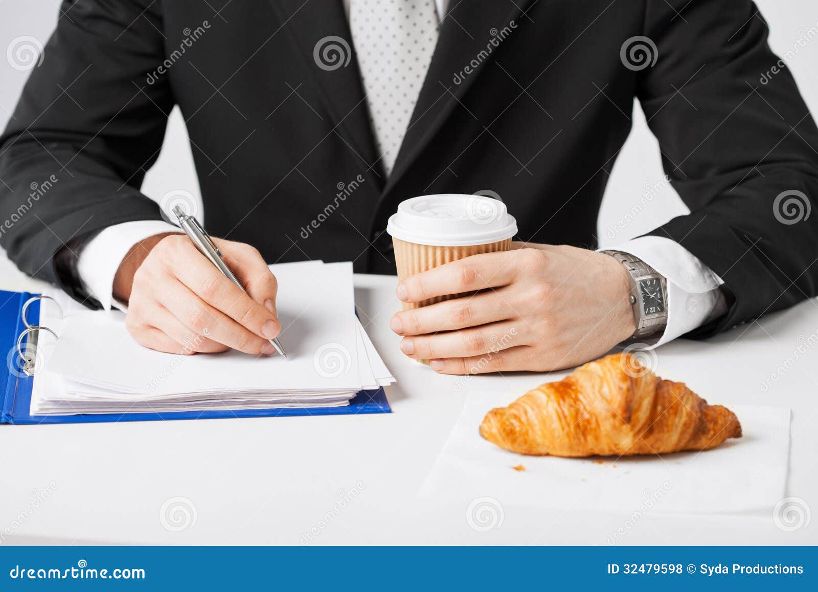 Businessman with Coffee Writing Something Stock Photo - Image of ...