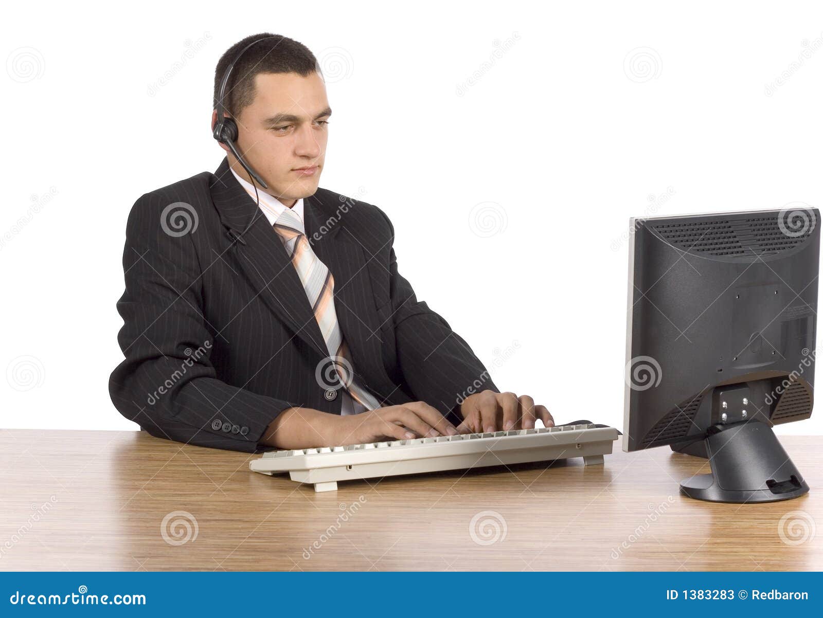 Businessman at the Computer Stock Image - Image of earphones, busy: 1383283