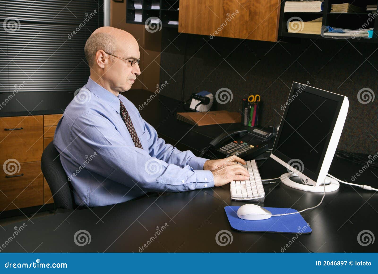 Businessman on computer stock image. Image of businesspeople - 2046897