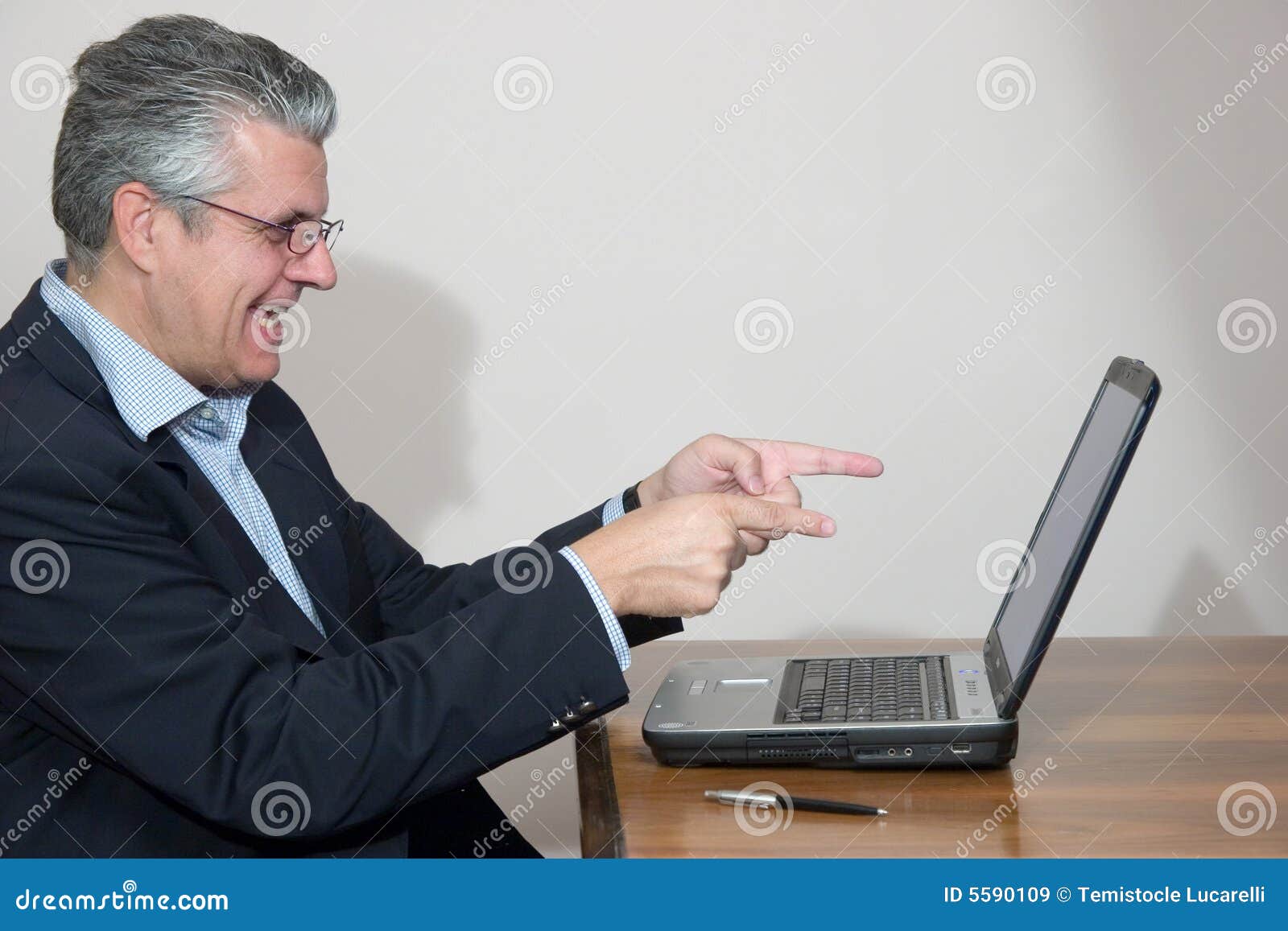 Businessman at computer stock image. Image of paper, jacket - 5590109