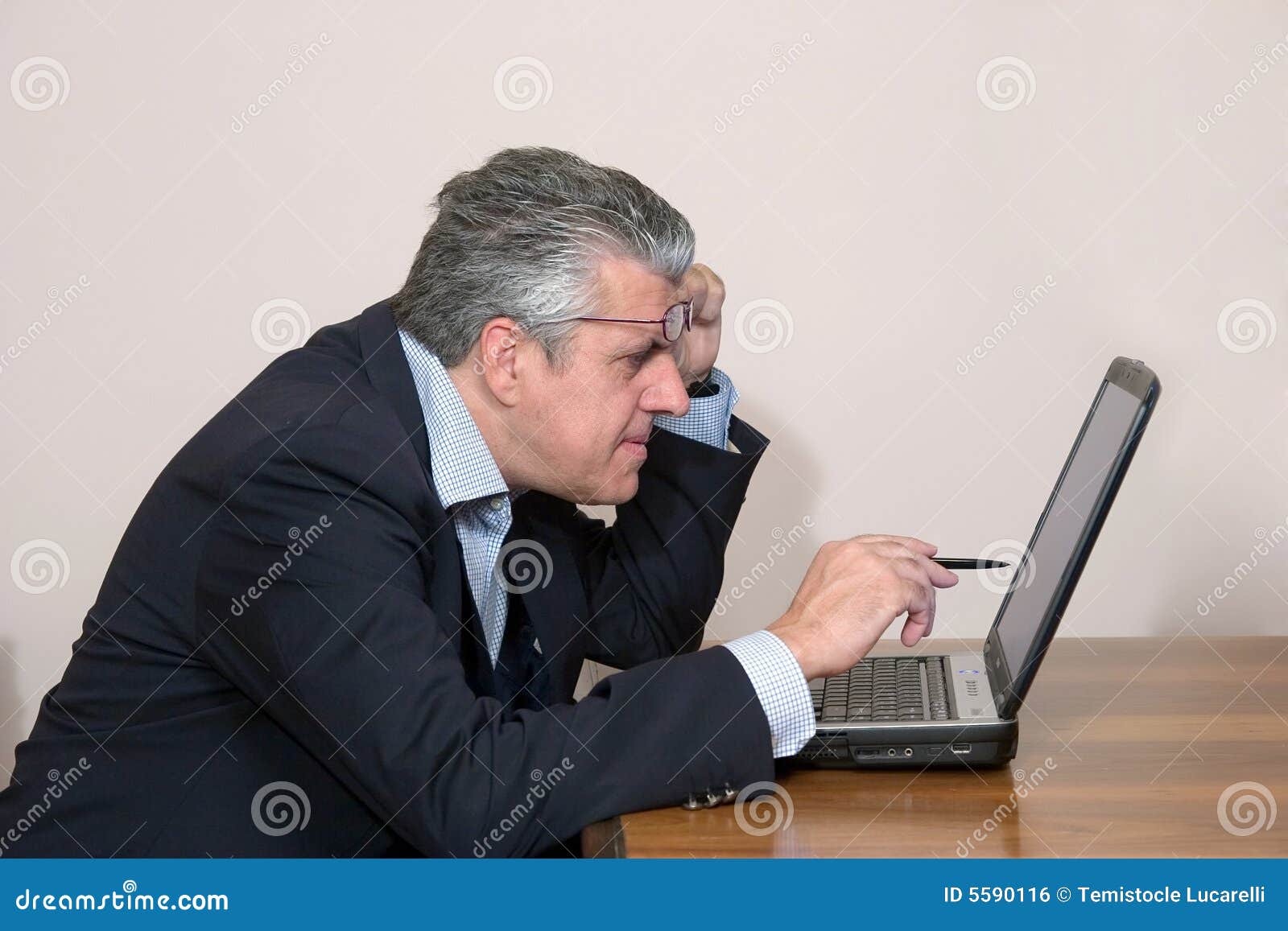 Businessman at computer stock photo. Image of application - 5590116