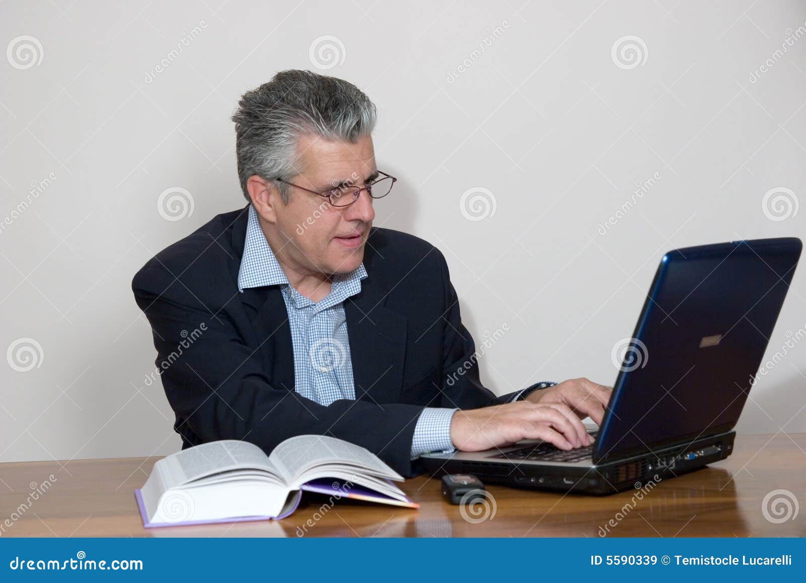 Businessman at computer stock image. Image of application - 5590339