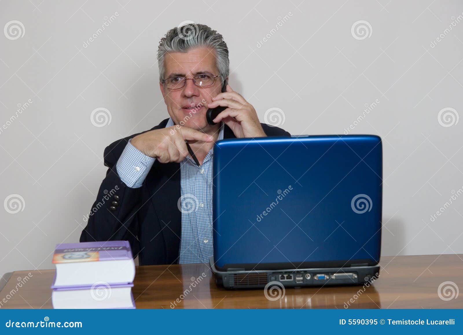 Businessman at computer stock image. Image of document - 5590395