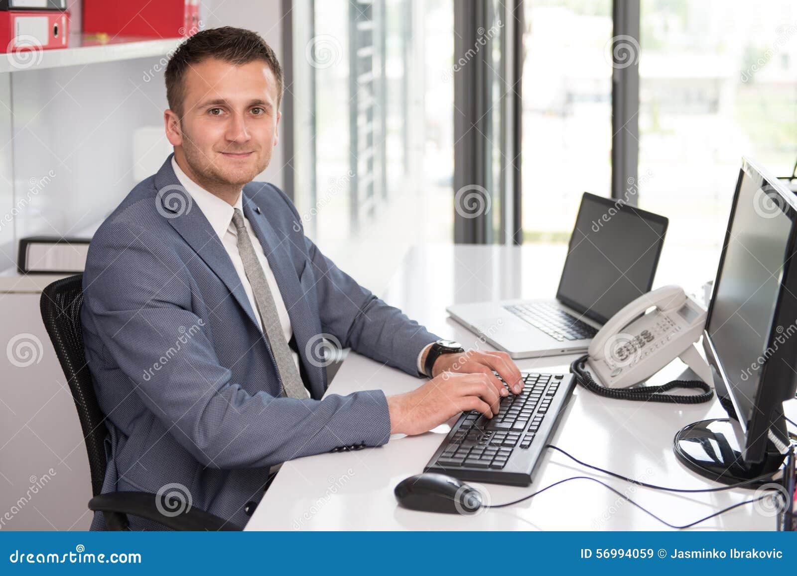 Businessman with Computer stock image. Image of male - 56994059