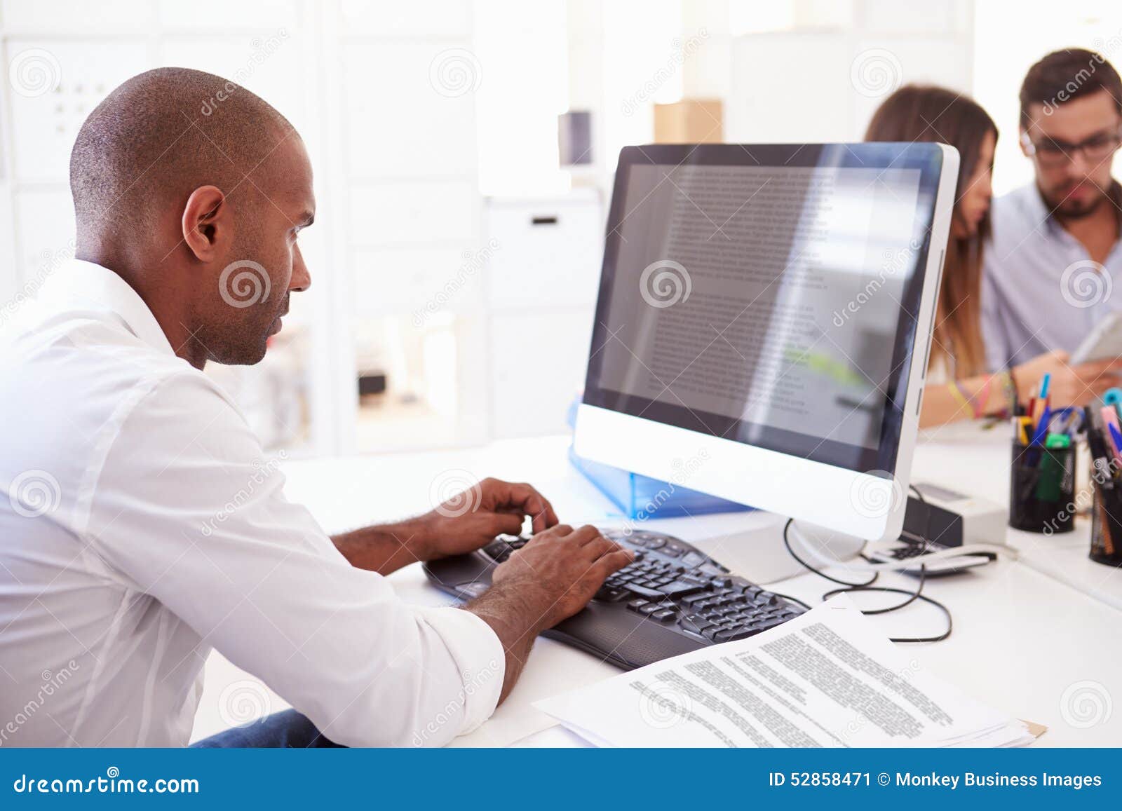 Businessman at Computer in Office of Start Up Business Stock Image ...