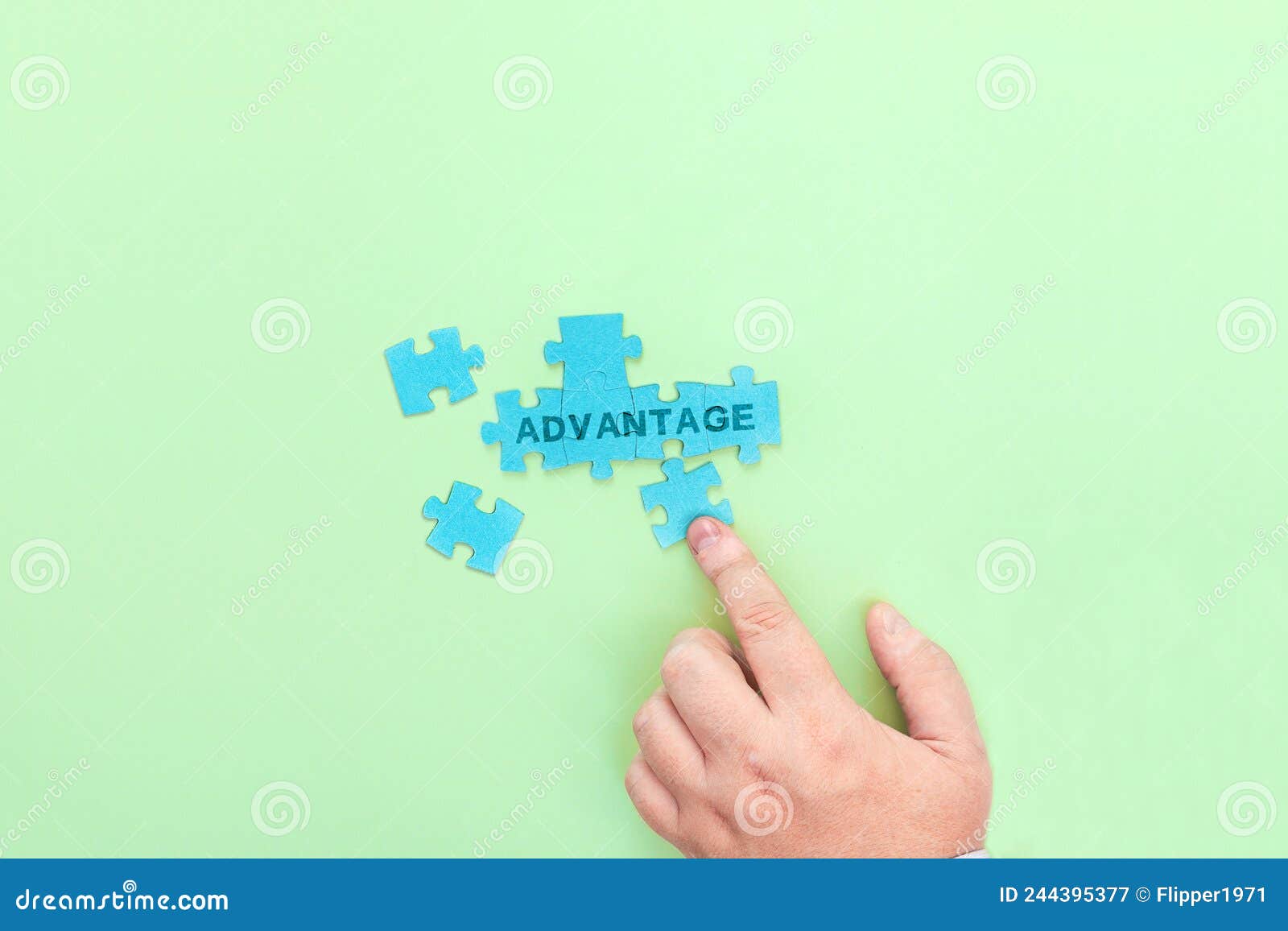 Businessman Connecting Puzzle Pieces with the Word Advantage Stock ...