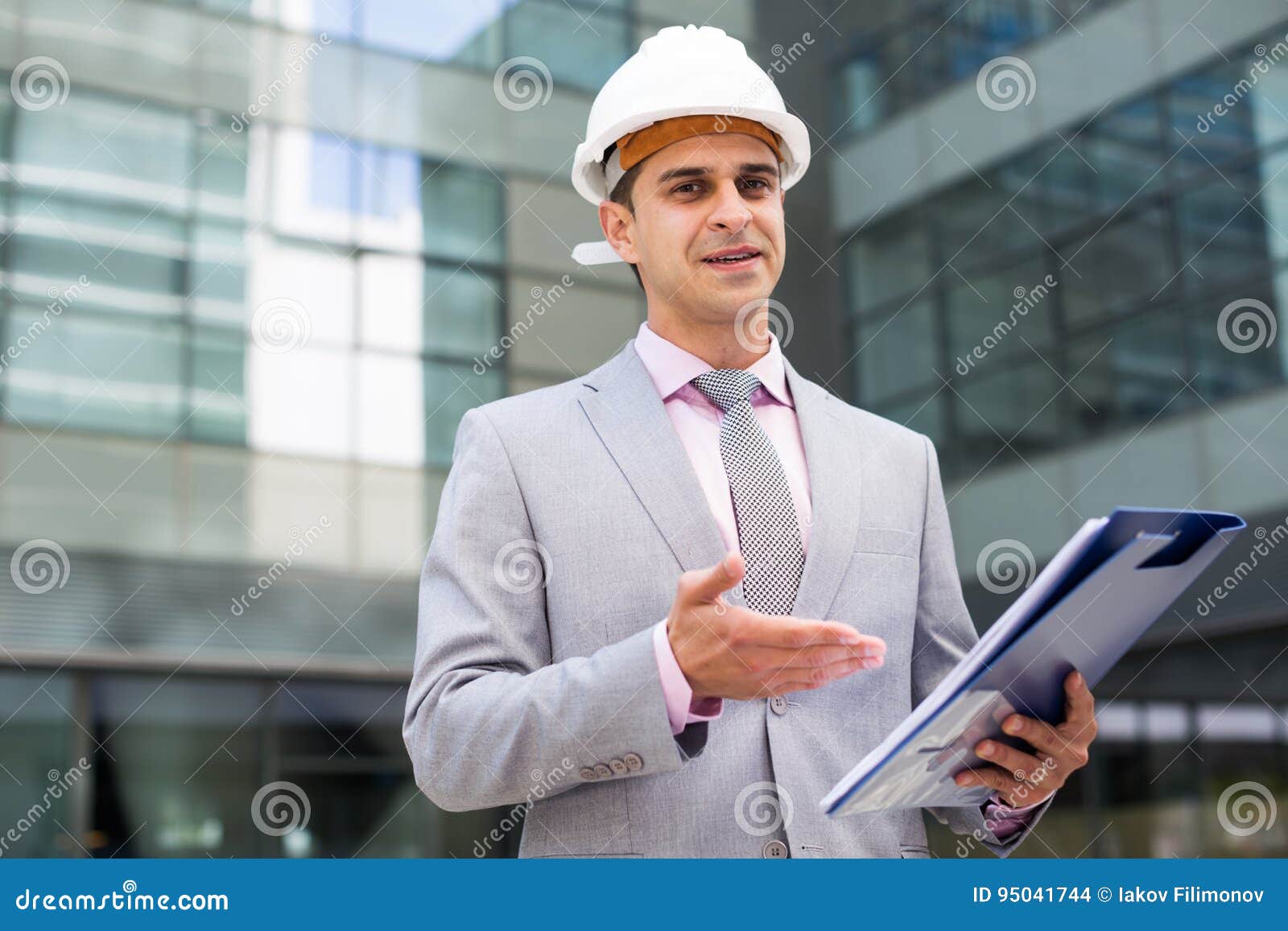 Businessman Contentedly Reading Documents Stock Photo - Image of ...